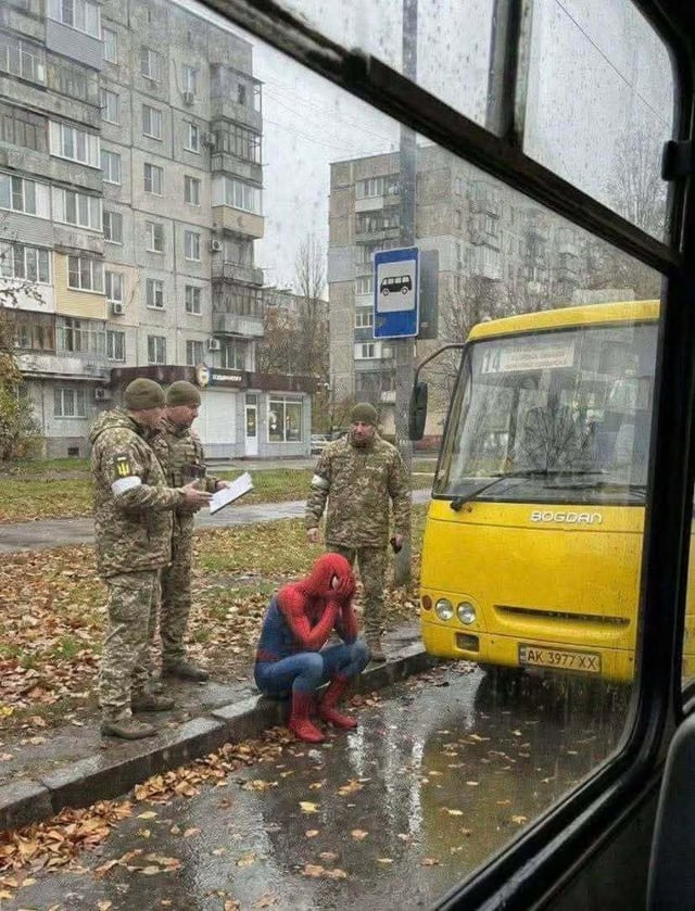 Spider-Man Looking Distressed Next to Soldiers and a Yellow Bus GagBase ...